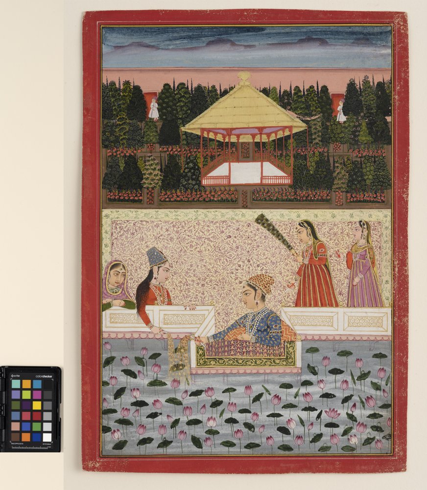 Ein Prinz und eine Prinzessin spielen mit Wunderkerzen an einem ...