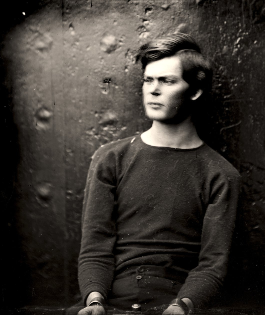 Lewis Powell in Handfesseln an Bord der USS Saugus, 1865