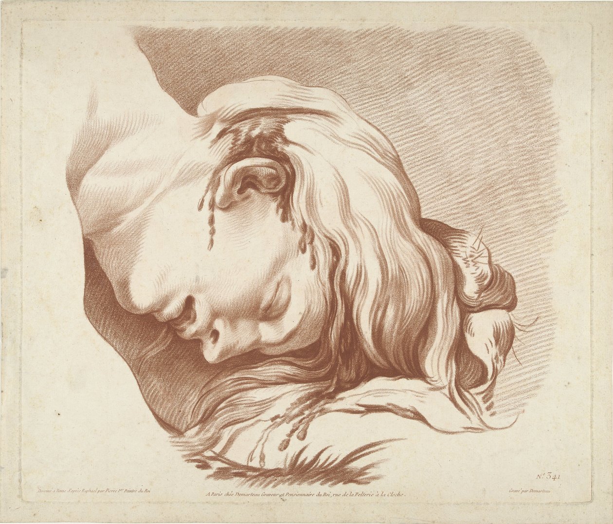 Kopf einer auf dem Boden liegenden Figur mit blutender Wunde